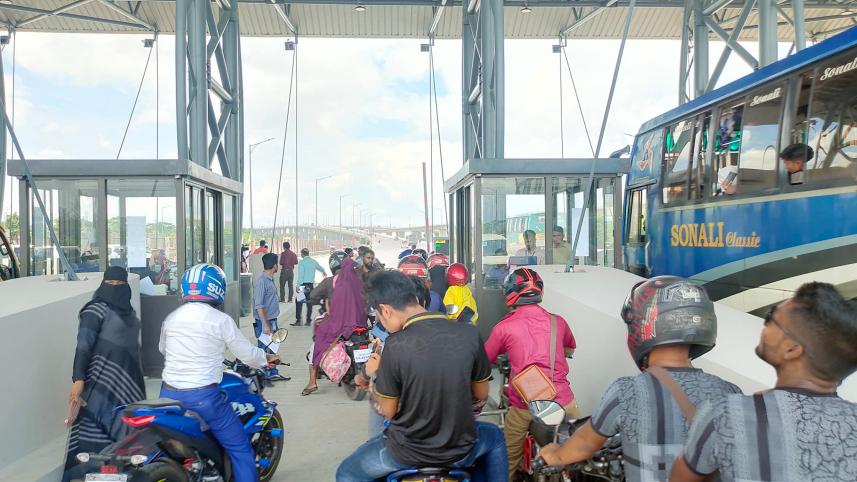 Tk 82 lakh toll collected from 15,200 vehicles on Padma Bridge in first ...